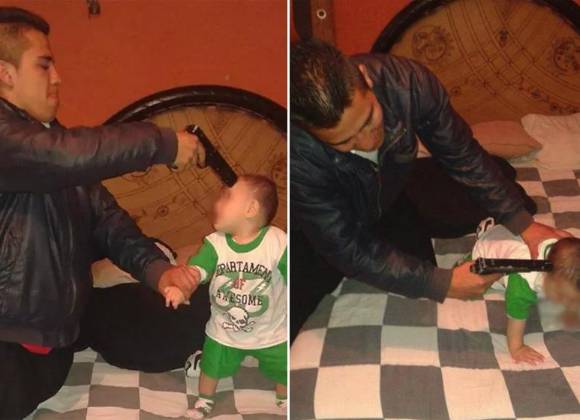 Apunta con arma a un bebé y genera indignación en redes sociales